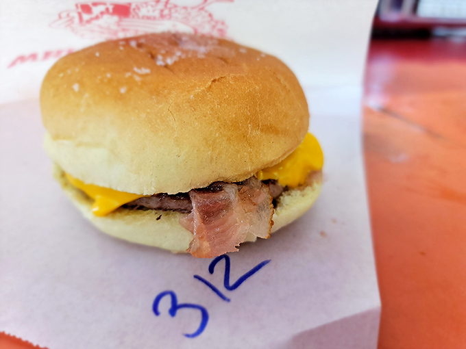 A bacon cheeseburger with the perfect meat-to-bun ratio. The kind of honest food that makes you question why anyone needs fancy culinary foam.