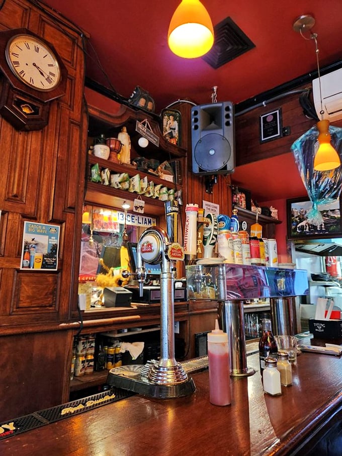 Behind every great pub is a bar that tells stories&mdash;this one with its vintage clock, amber lighting, and taps ready to pour liquid comfort.