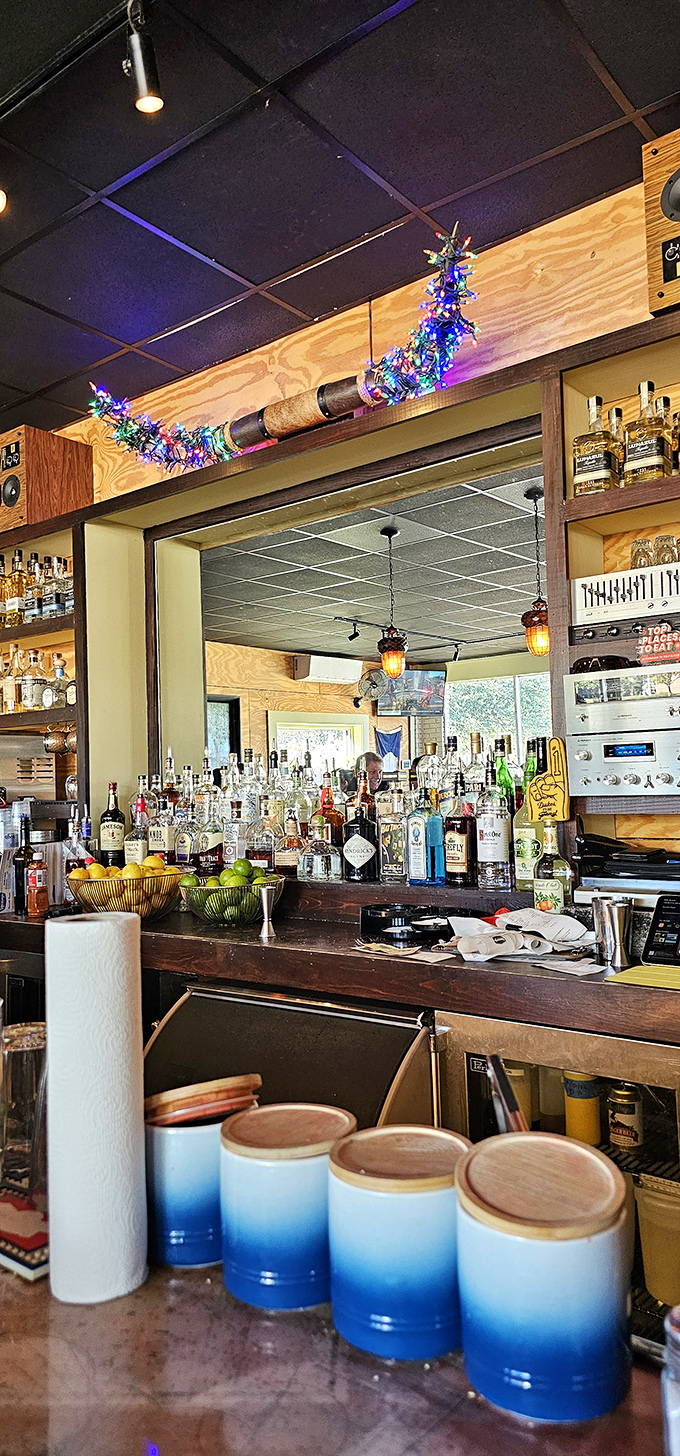 The bar at Heavy's&mdash;where holiday lights stay up year-round and the bourbon selection suggests someone really knows their stuff.