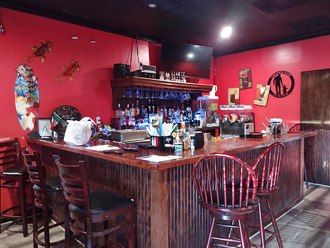 Where margarita magic happens. The bar area promises liquid sunshine in salt-rimmed glasses that pair perfectly with everything on the menu.