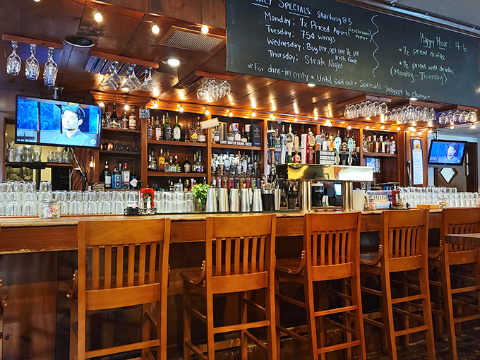A bar that invites you to pull up a stool and stay awhile. The chalkboard specials hint at delicious possibilities.