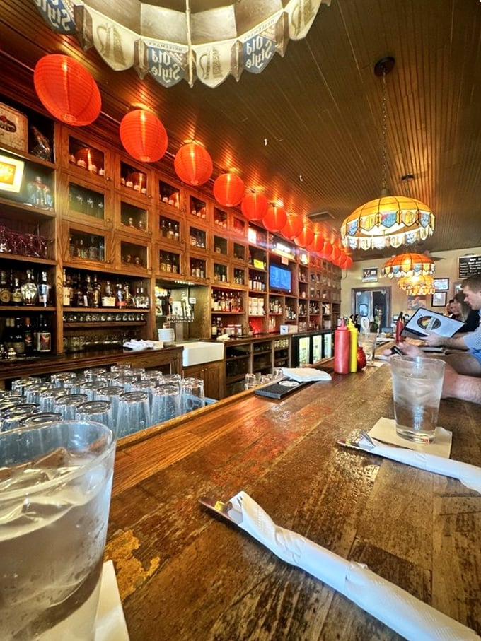 The bar isn't just serving drinks; it's preserving history. Those red lanterns aren't decoration &ndash; they're beacons guiding thirsty travelers home.