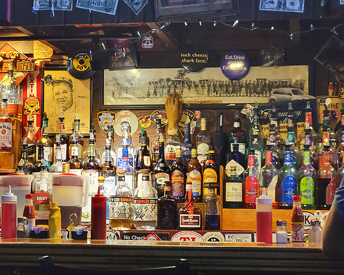 The bar doesn't just serve drinks &ndash; it serves history, with bottles standing at attention like soldiers guarding liquid happiness.
