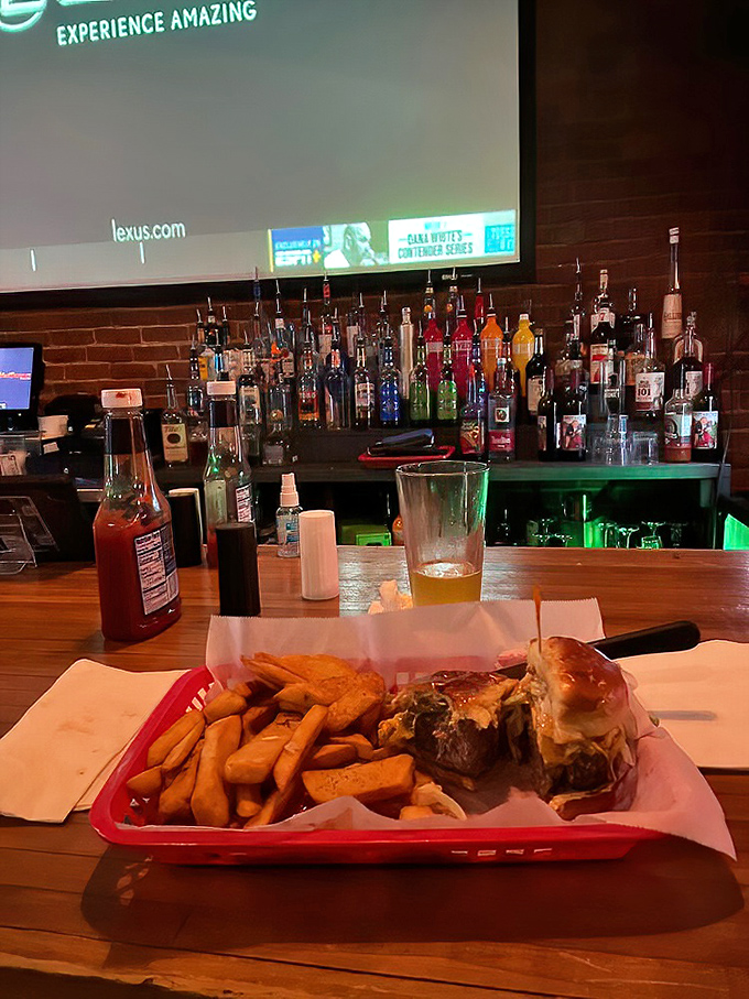 The well-stocked bar promises liquid refreshment while your sandwich masterpiece is being constructed in the kitchen.