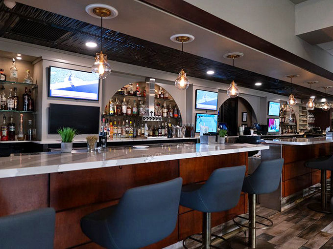 A bar that understands the importance of proper lighting, comfortable seating, and enough spirits to raise anyone's spirits.