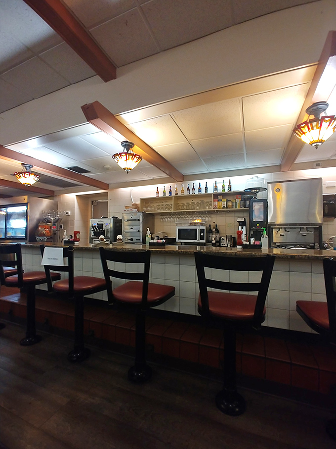 The counter seating offers front-row views of the kitchen action &ndash; where breakfast dreams become reality without any unnecessary culinary theatrics.