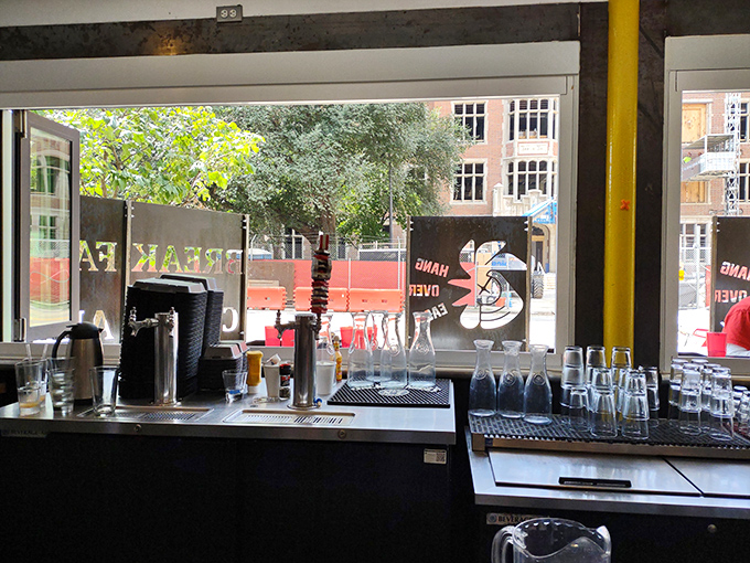 The bar counter view&mdash;where breakfast meets beverages in perfect harmony. Morning mixology happens here, one coffee or mimosa at a time.