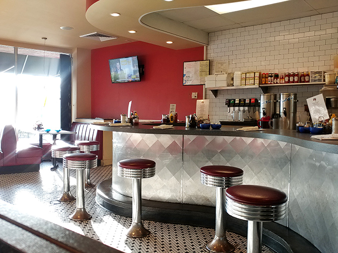 The counter seating: where solo diners become temporary neighbors and the breakfast show unfolds before your very eyes.