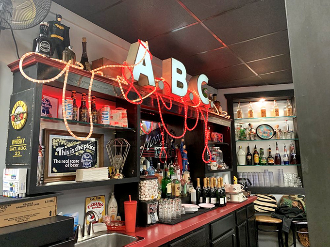 The bar area whispers "come back later" with its vintage charm. Those ABC letters aren't just signage&mdash;they're a promise of good times ahead.