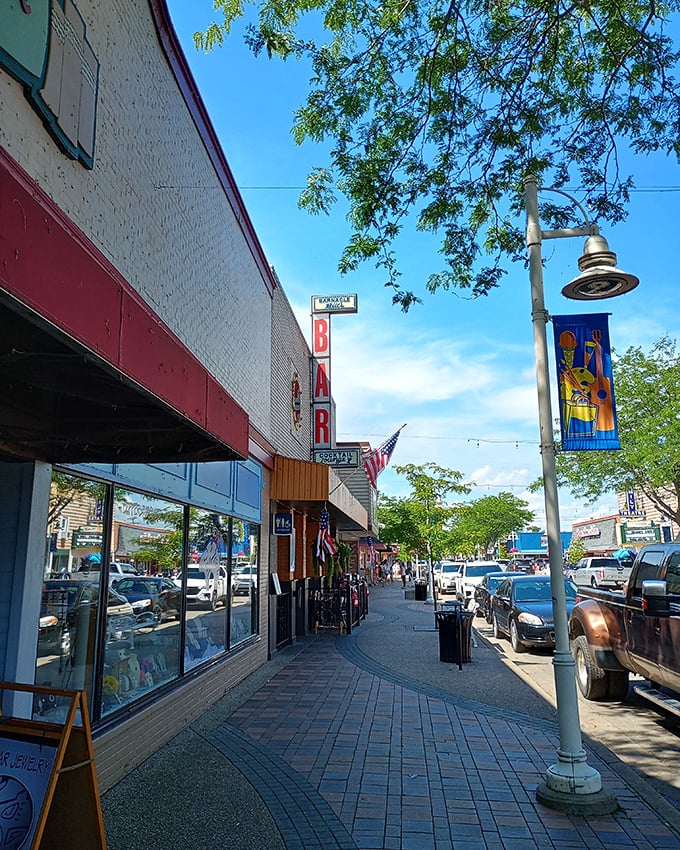 Patriotic bunting declares this establishment proudly American. That fire hydrant stands ready for duty while hoping it's never needed.