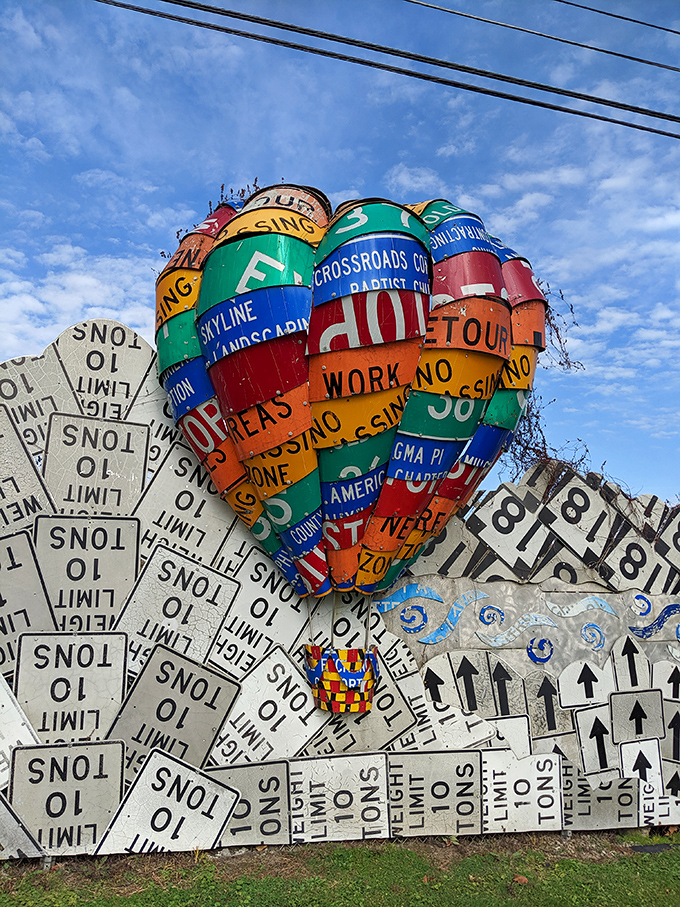 Heart-stopping art&mdash;literally! This vibrant hot air balloon made from street signs carries messages of community connection rather than traffic direction. Love is in the air!