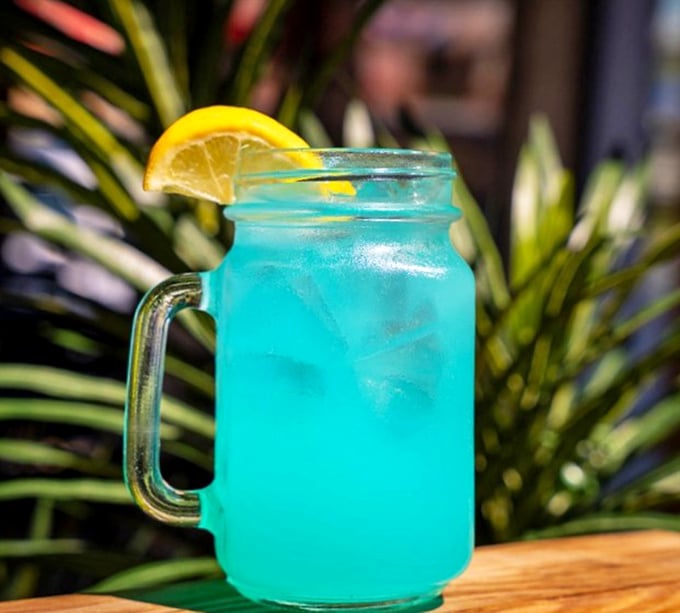 Electric blue lemonade that looks like it could power a small city. One sip and you'll understand why adults deserve fun drinks too.