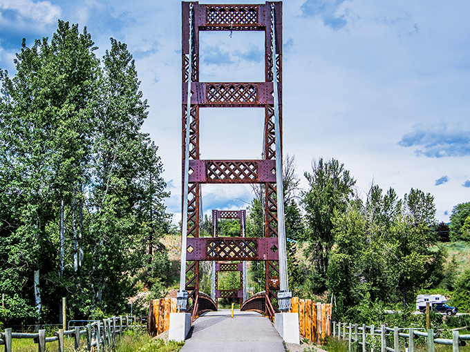 This rustic bridge connects more than just riverbanks—it's a passage between the everyday world and Winthrop's simpler pace of life.