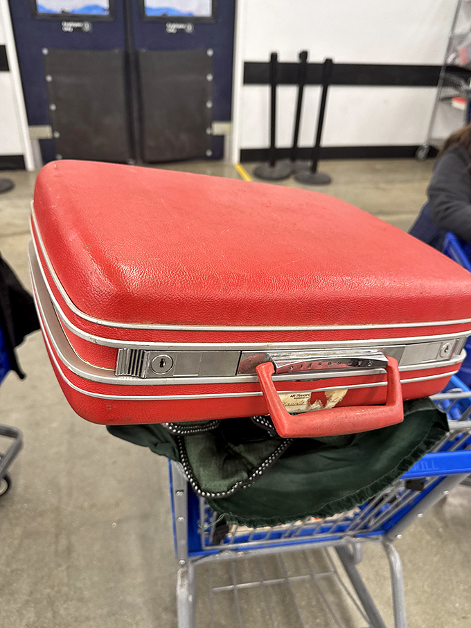 This vintage red suitcase has stories to tell&mdash;of road trips taken and adventures postponed, now waiting for its next chapter.