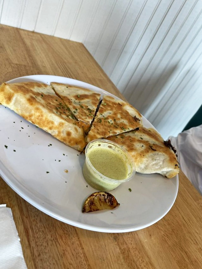 The brisket quesadilla &ndash; proof that cultural fusion isn't just a good idea, it's a moral imperative for your taste buds.