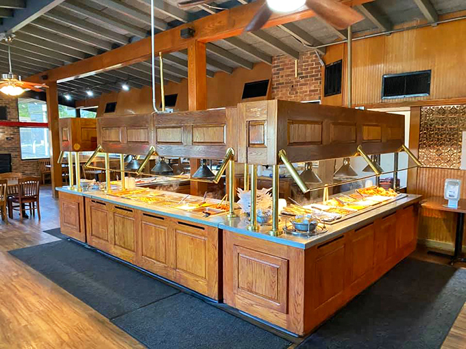 A buffet island designed for maximum food-to-plate efficiency. The wooden craftsmanship almost makes you forget you're about to demolish your diet.