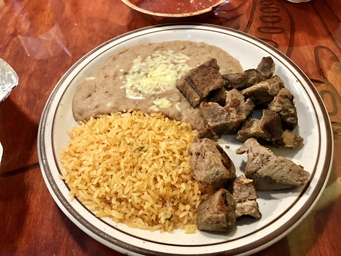 Carnitas with that perfect balance of tenderness and crispy edges. This is pork that has achieved its highest purpose in life.