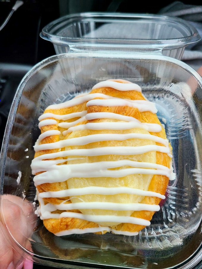 A danish that deserves its own Instagram account&mdash;layers of pastry cradling what appears to be cream cheese frosting in perfect harmony.