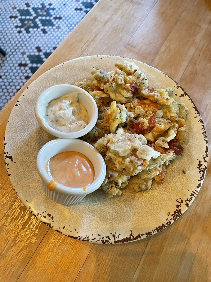 Crispy, golden cheese curds served with house-made dipping sauces&mdash;the kind of appetizer that makes you reconsider sharing with your table.