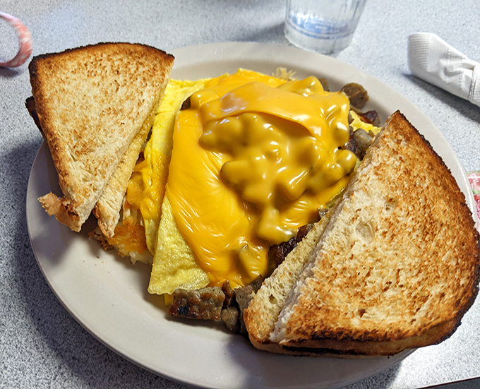 Melted cheese drapes over fluffy eggs like a warm blanket on a cold Wisconsin morning&mdash;comfort food that speaks directly to your soul.