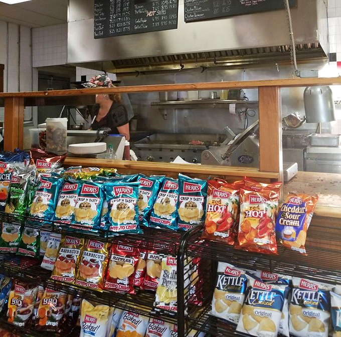 The chip display &ndash; where good intentions about "just having a sandwich" go to die amid the siren call of crunchy potato perfection.