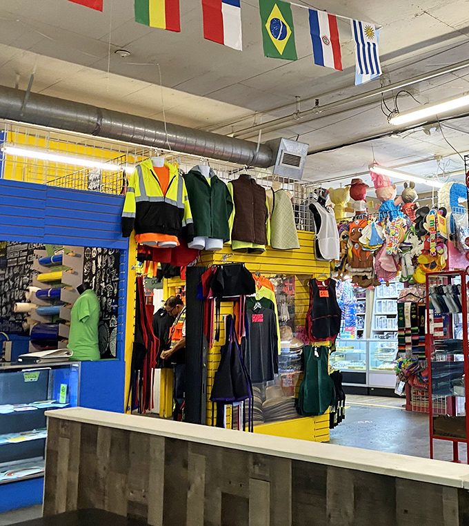 International flags fly proudly above practical workwear. It's a visual reminder that commerce speaks a universal language we all understand.