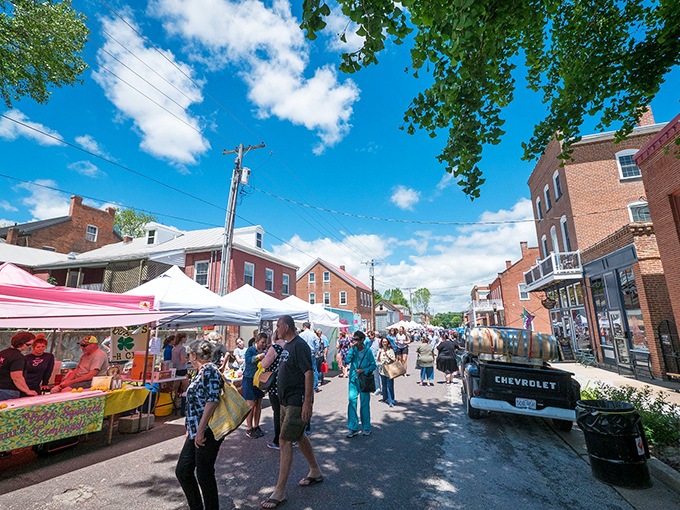 Hermann's street festivals transform ordinary roads into extraordinary community gatherings. Nothing builds appetite like browsing local vendors under that perfect Missouri sky.