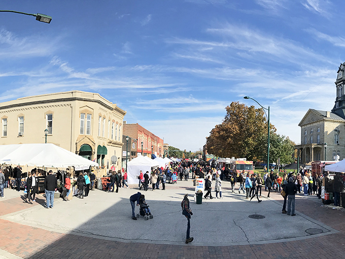 Town square festivals bring the community together under autumn skies, proving that the best social network has always been your actual neighbors.