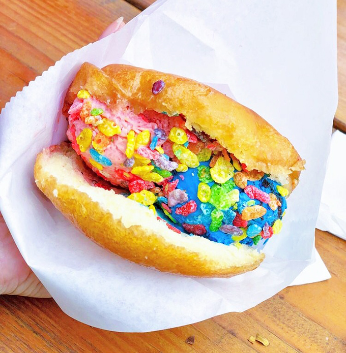 Cereal-sly amazing! This rainbow sandwich looks like Saturday morning cartoons and tastes like childhood dreams upgraded for adult palates.