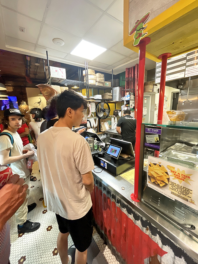 Where the magic happens&mdash;customers eagerly place orders at the counter while staff prepare fresh Mexican delights just feet away.