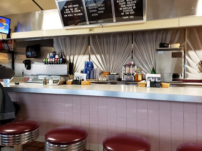 The counter view: where magic happens on the griddle and regulars have claimed their favorite stools through years of faithful patronage.