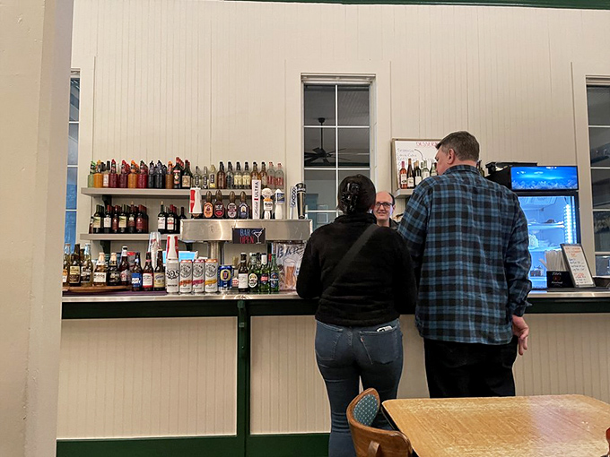 The ordering counter &ndash; where seafood dreams begin and difficult decisions must be made. That giant fish overhead? He's seen it all, including your indecision.