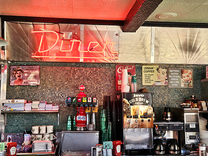 Vintage signs and soda fountains create the perfect backdrop for life's most important questions: "More coffee?" and "Apple or cherry?"