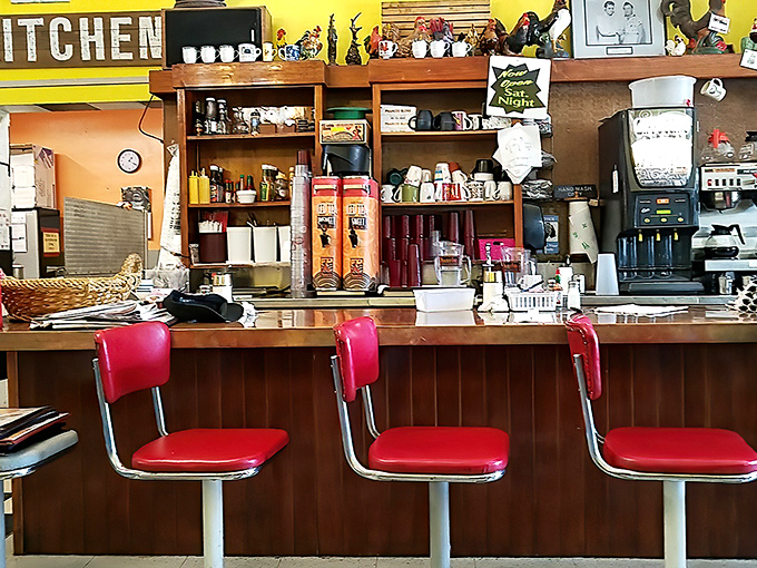 Red vinyl counter seats invite you to spin slightly while waiting for your order. Some childhood joys never need upgrading.