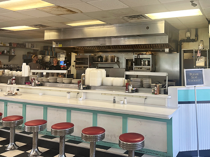 The counter seats&mdash;the VIP section for solo diners who appreciate the rhythmic ballet of short-order cooks at work.