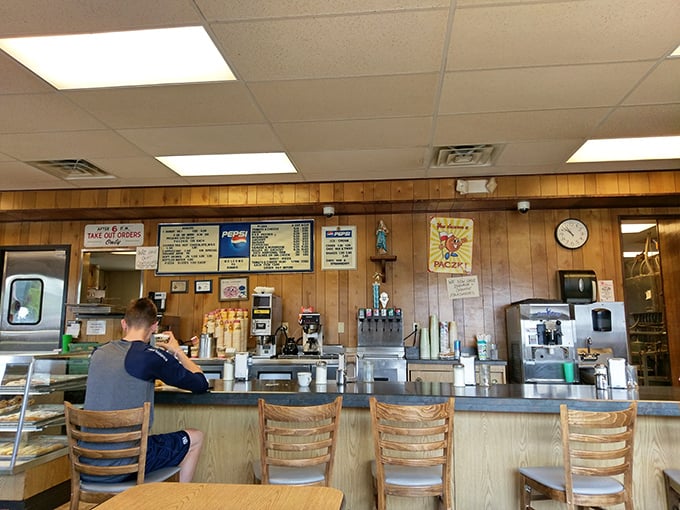 The counter seats offer front-row tickets to the show&mdash;regulars know this is where the best conversations and freshest donuts happen.