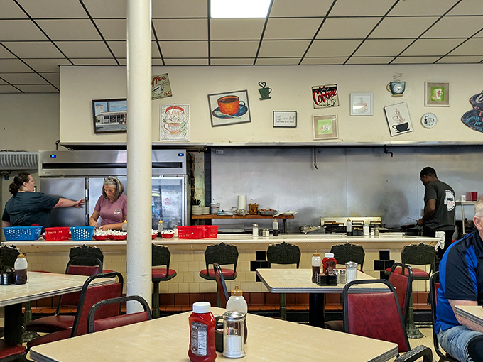 The counter seats – prime real estate for solo diners and regulars who've earned the right to gentle ribbing from servers who know their order by heart.