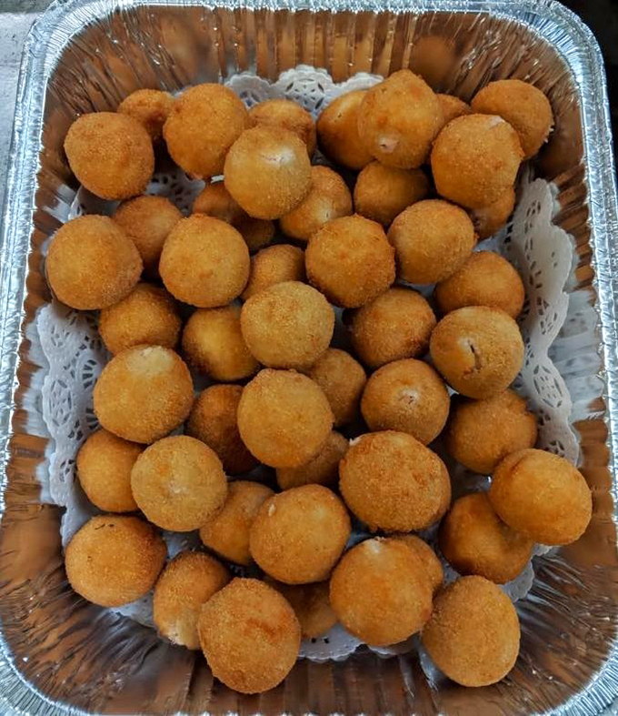 These golden spheres of fried goodness look like they could solve all of life's problems, at least until the last one disappears from the tray.