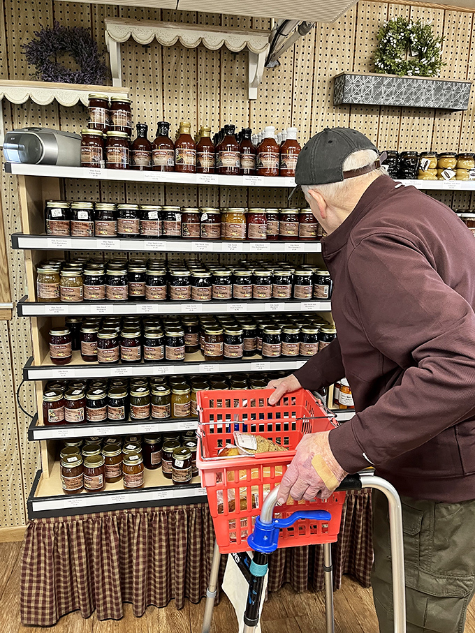 The jam section: where fruits achieve immortality. This shopper knows that breakfast tomorrow depends on decisions made today.