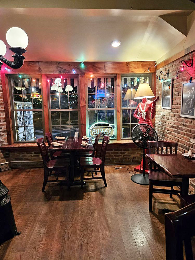 The exposed brick walls and polished wood floors create a space that feels both historically significant and comfortably contemporary.