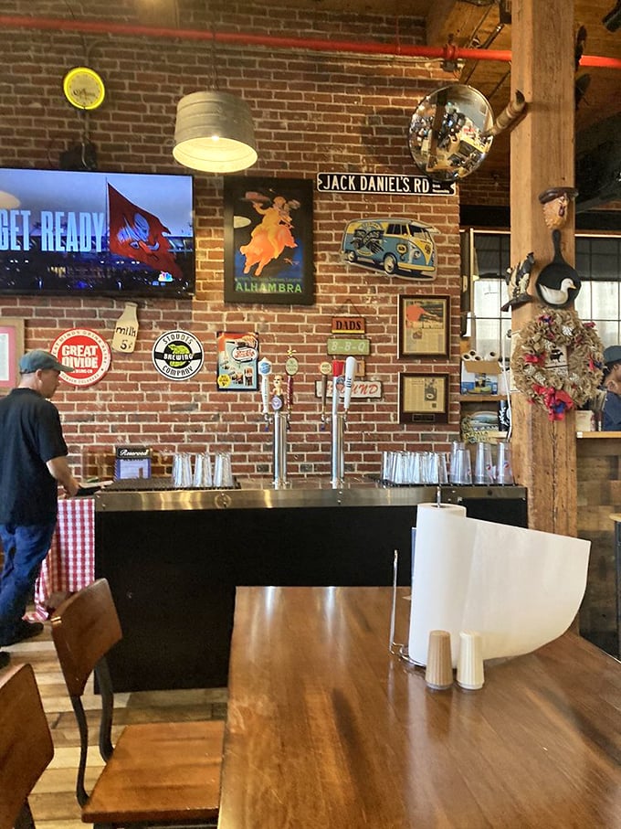 The bar area features nostalgic signs and exposed brick that say, "Settle in, pardner&mdash;good things come to those who aren't in a hurry."