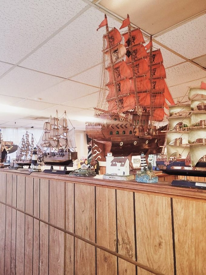 The open kitchen where magic happens. No secrets here—just dedicated cooks performing the same delicious ritual they've perfected over decades.