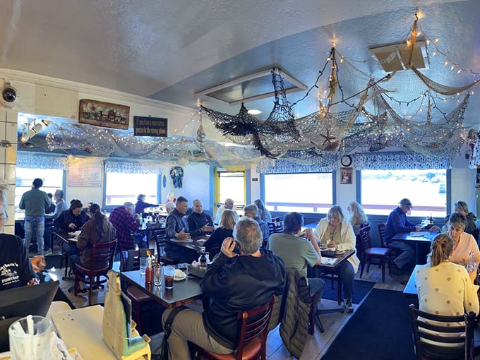 The packed dining room tells you everything you need to know: when locals and tourists agree on a place, you've struck culinary gold.
