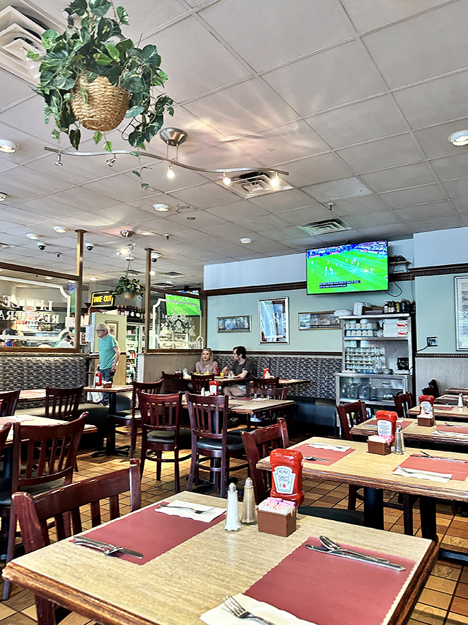 A dining room where sports play on TV, conversations flow freely, and nobody's taking pictures of their food&mdash;just enjoying it. The way eating out should be.