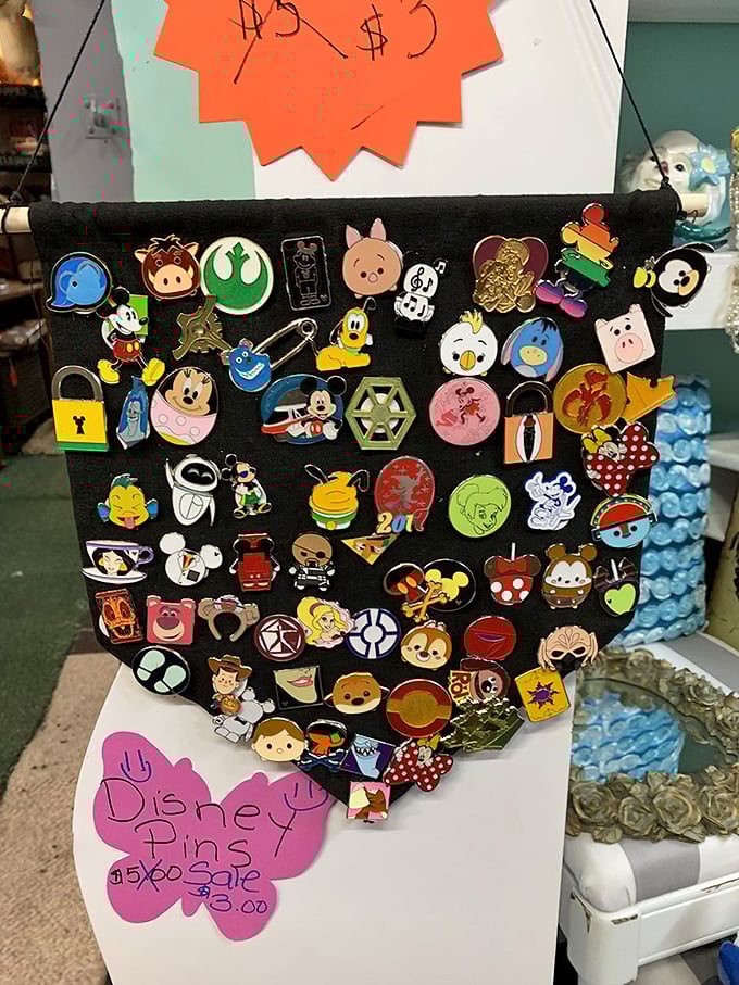 Disney pin trading heaven! Each tiny character represents someone's collection, memory, or childhood dream&mdash;all waiting for their next adventure. 