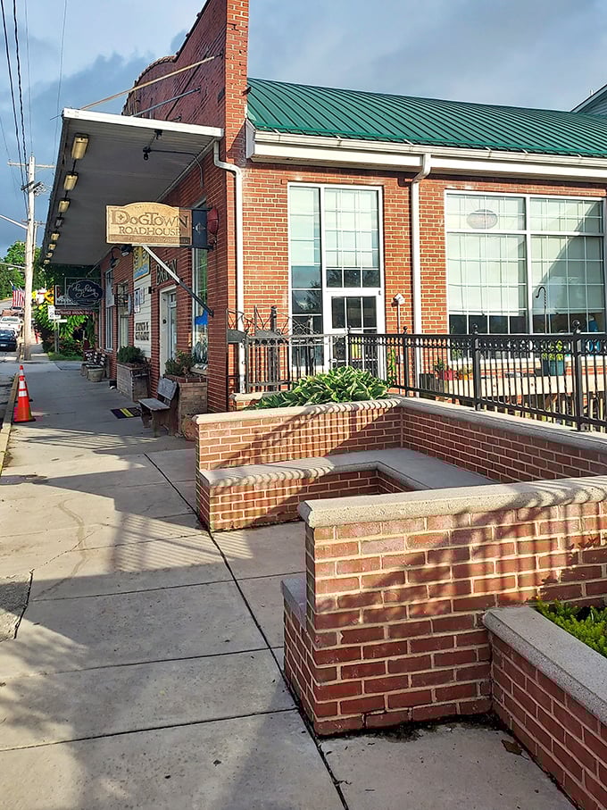 Dogtown Roadhouse's inviting brick patio offers the perfect perch for people-watching while sampling local brews and wood-fired delights.