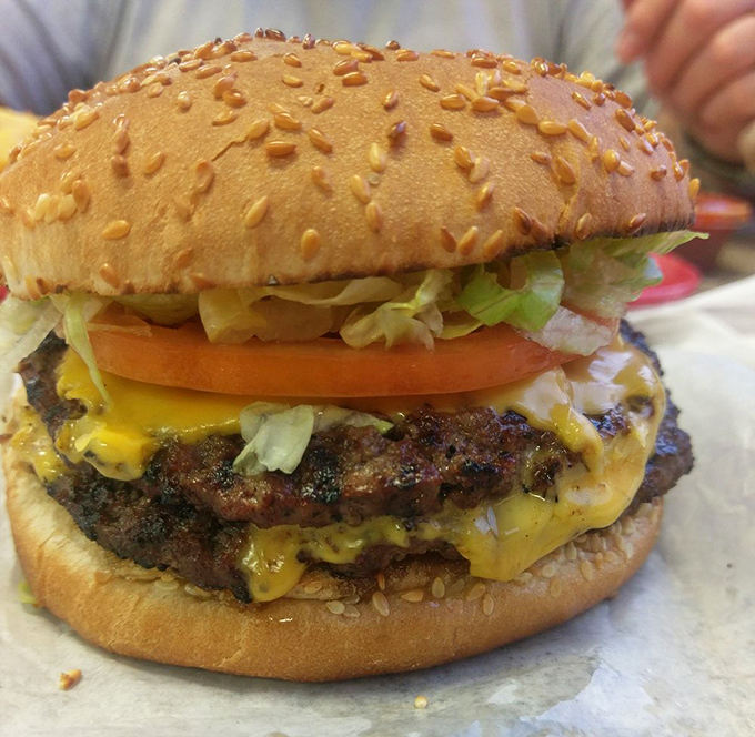 This isn't just a burger&mdash;it's an architectural marvel of beef, cheese, and green chiles that requires both hands and zero shame.