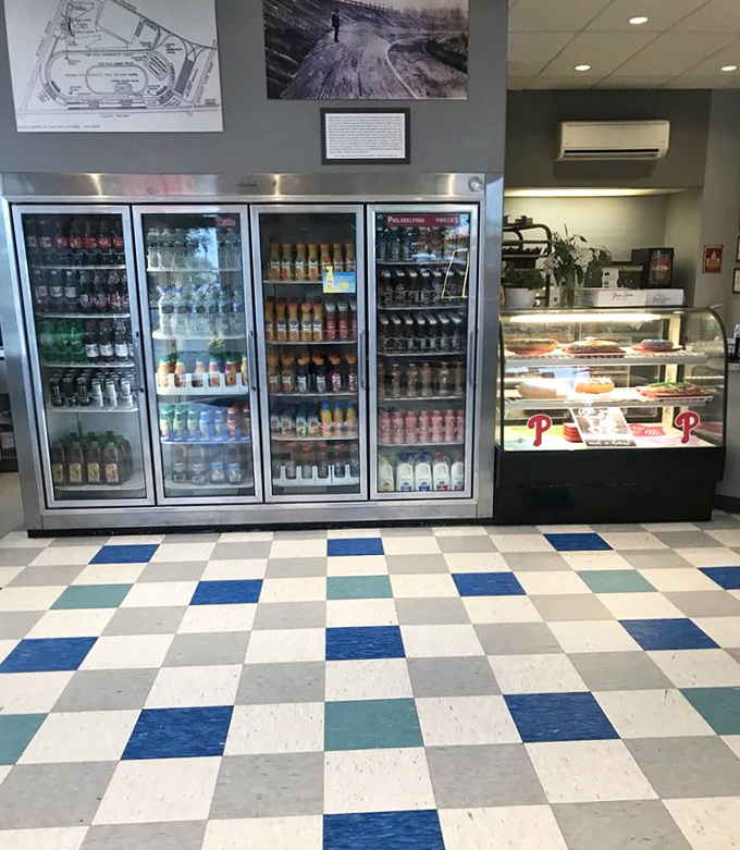 The drink coolers stand at attention like guards at Buckingham Palace. Their contents promise proper hydration between sugar-induced euphoria.