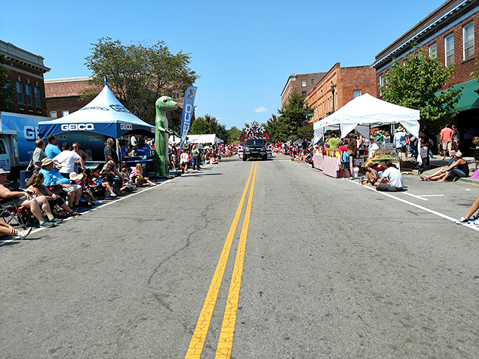 Festival season transforms Main Street into a community living room, complete with inflatable dinosaurs because... why not?