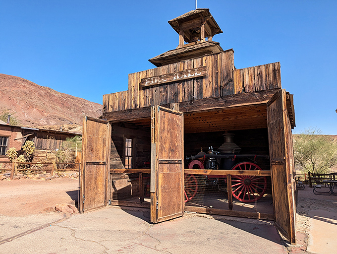 This rustic fire hall housed the equipment that stood between Calico and disaster – basically the frontier version of having a good insurance policy.